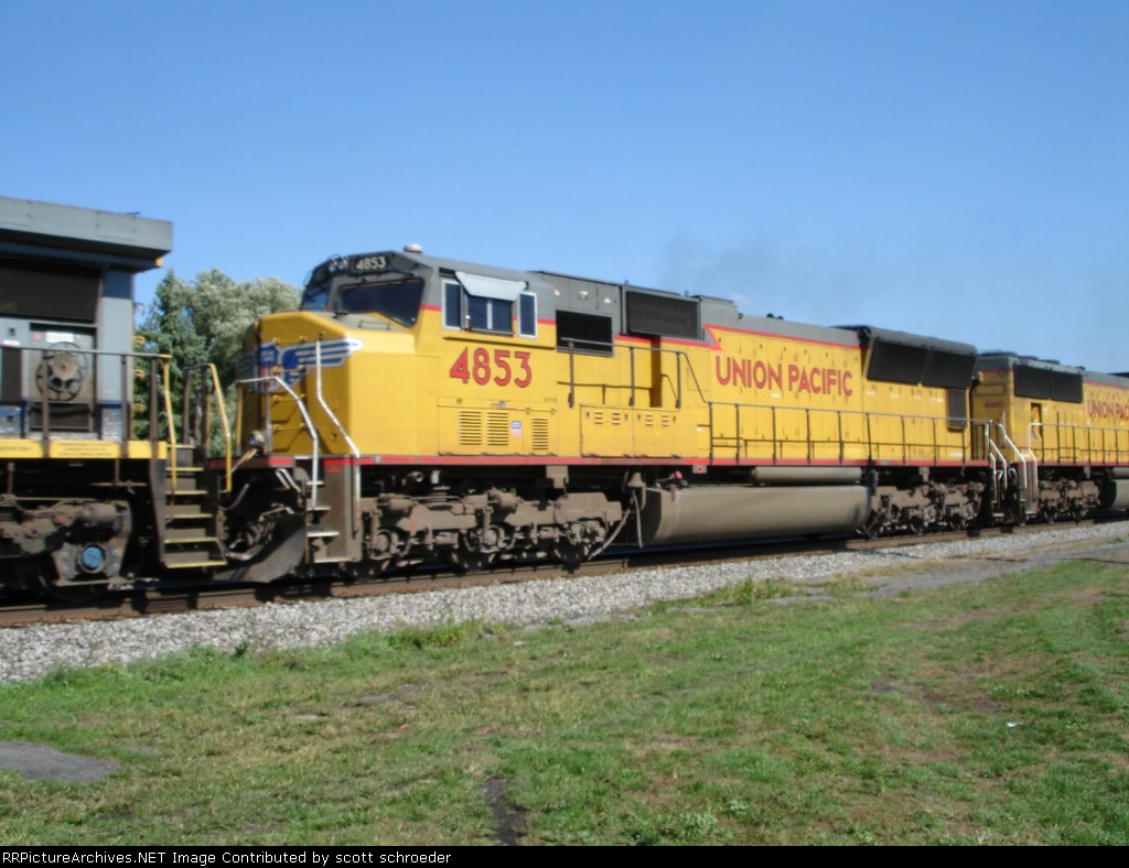 UP 4853 & UP 4400 behind some CSX Quality WB on the Shore